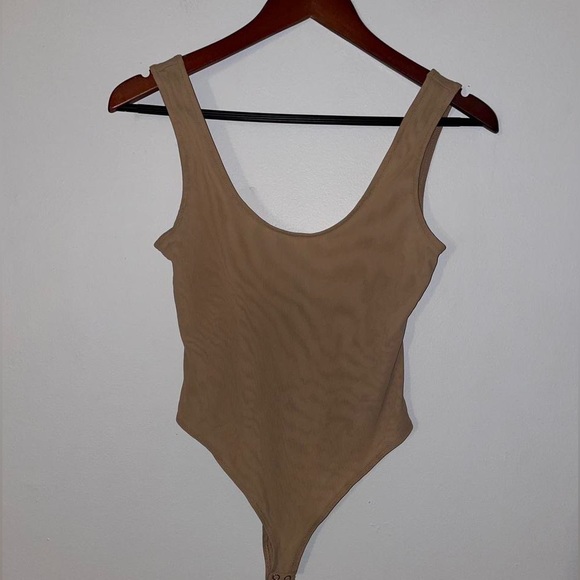 Tops | Forever 21 Medium Mesh Tan Body Suit | Poshmark